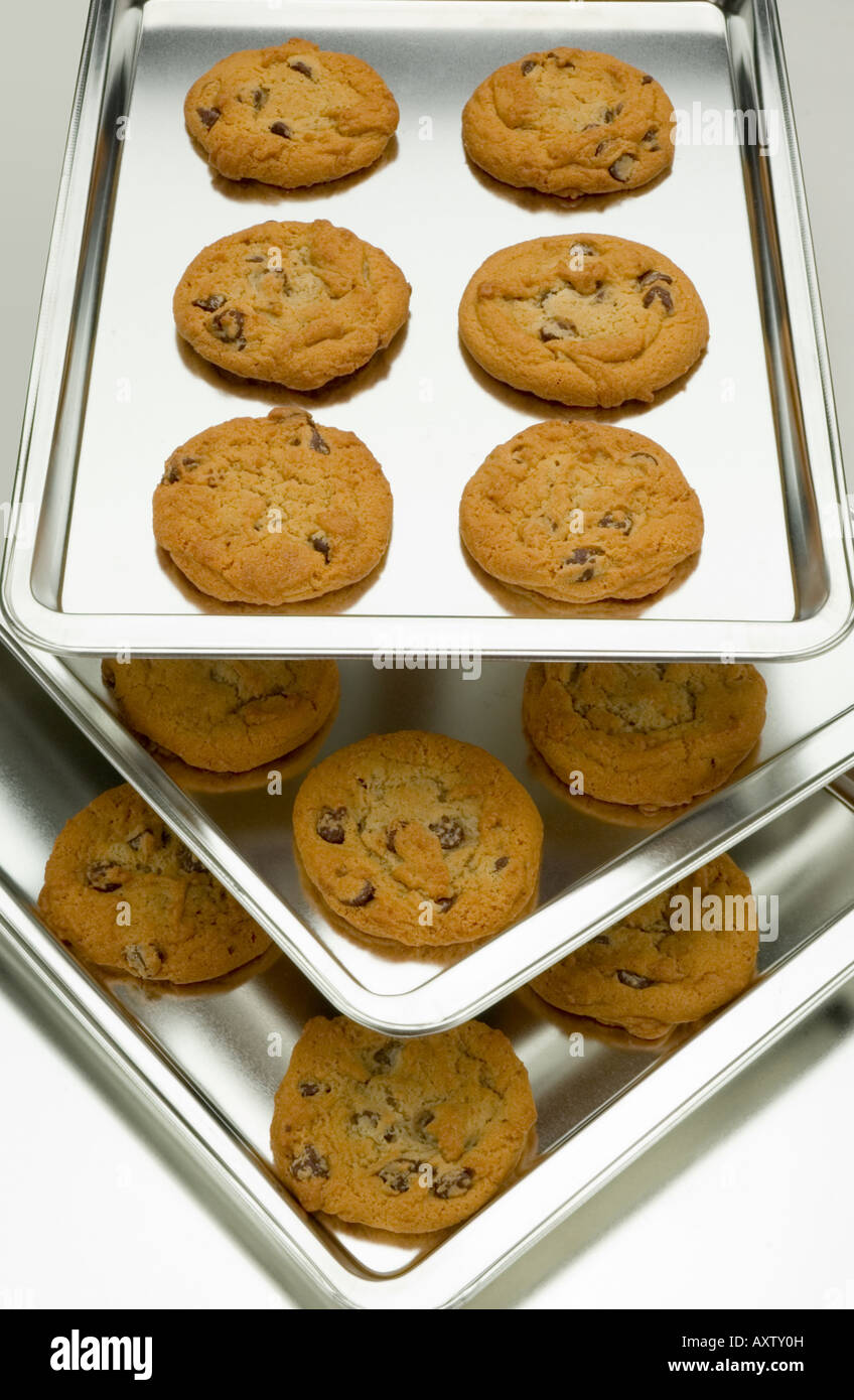 Chocolate chip cookies cooling on trays Stock Photo - Alamy