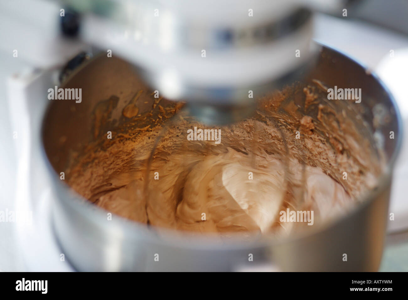 Making chocolate cream using kitchen mixer Stock Photo - Alamy