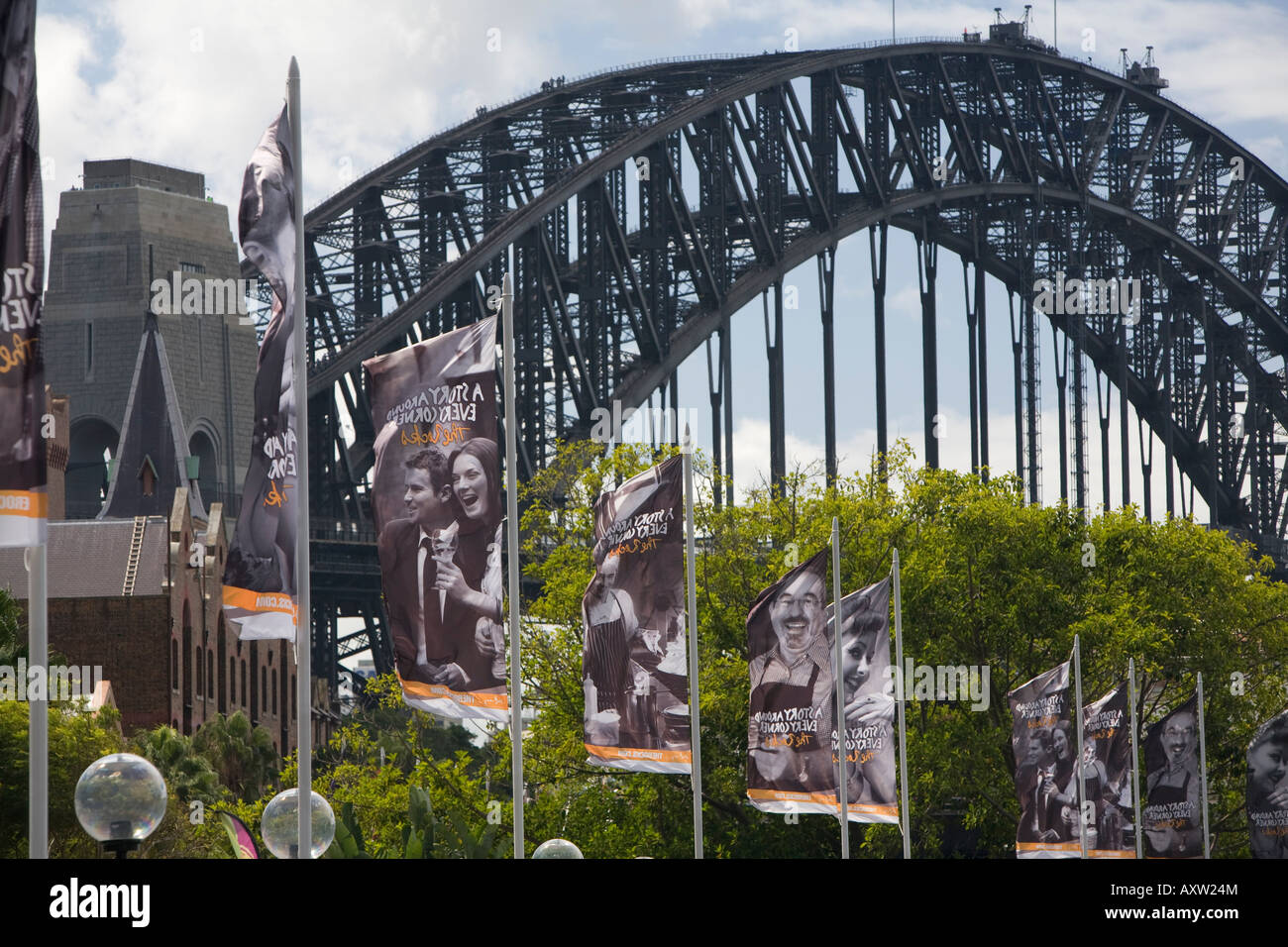 Sydney harbour bridge and banners flying in the Rocks area of Sydney ...