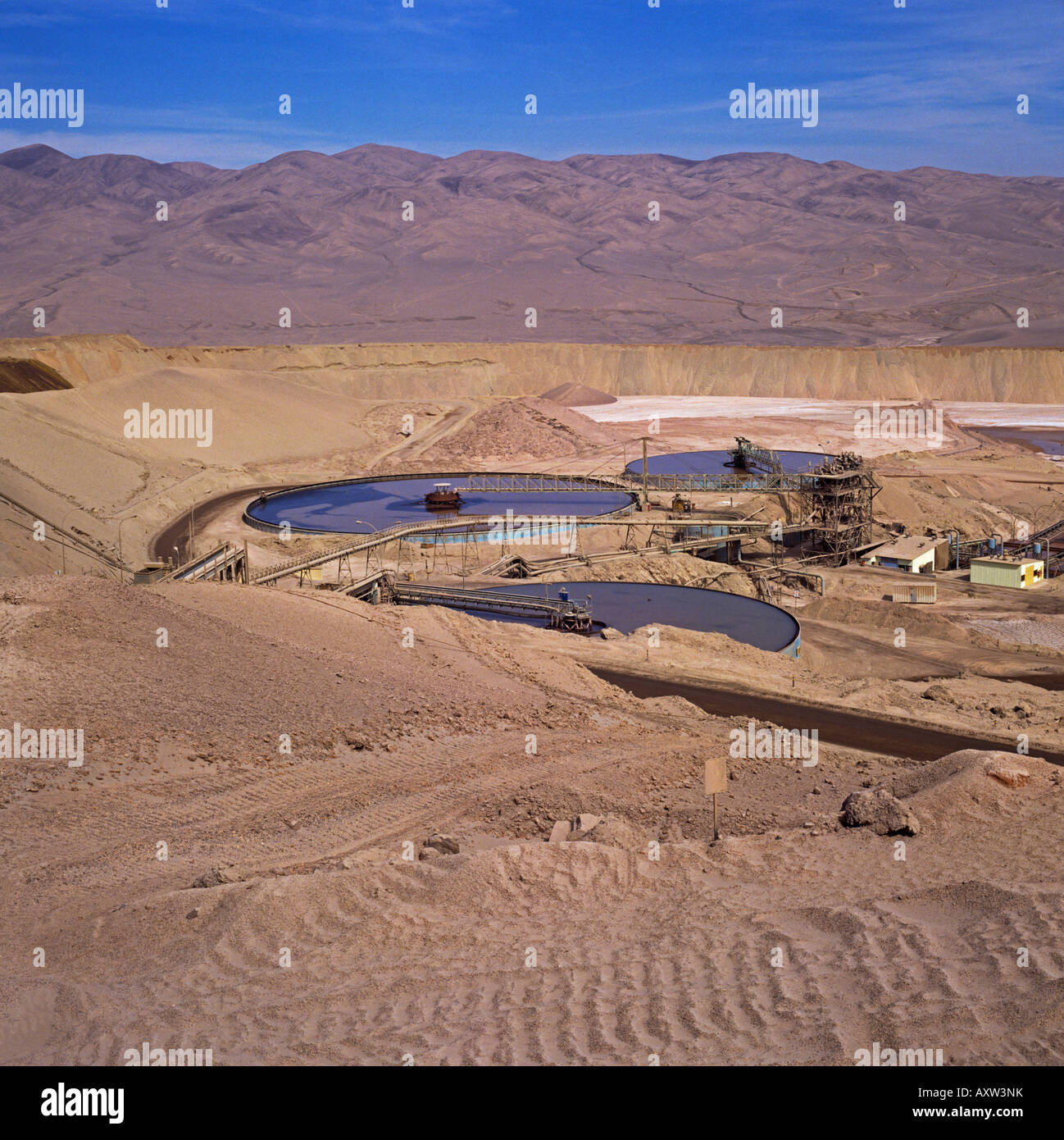 View over copper processing plant including crusher, conveyor belt ...