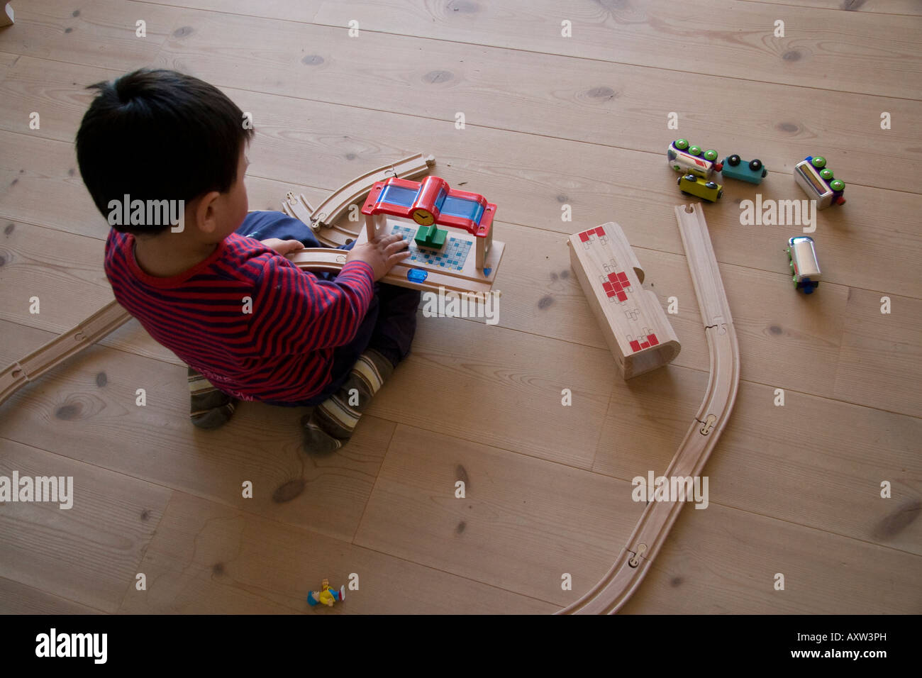 children play with toy train Stock Photo - Alamy