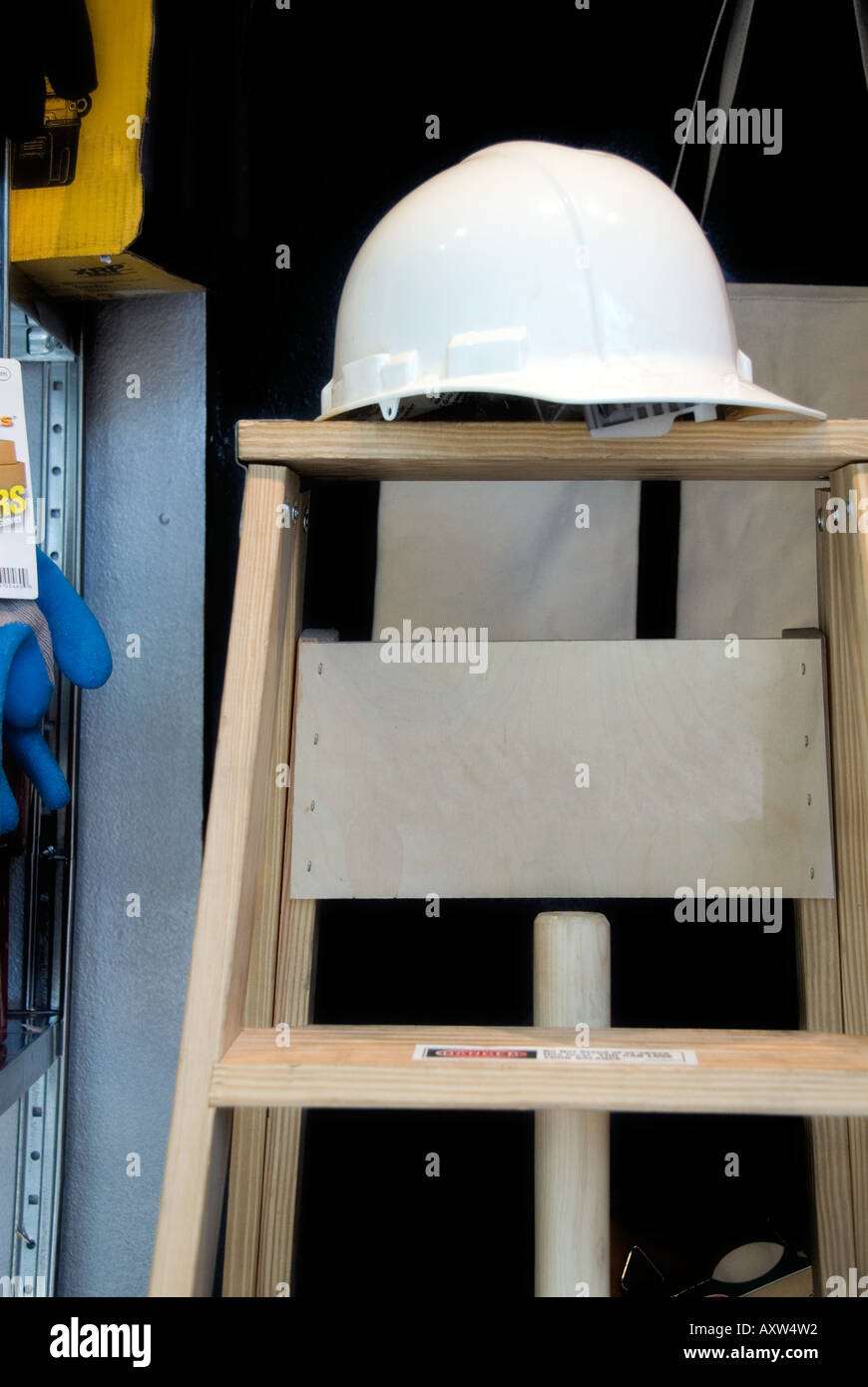 Hard hat ladder and tool display in a retail store window Stock Photo ...