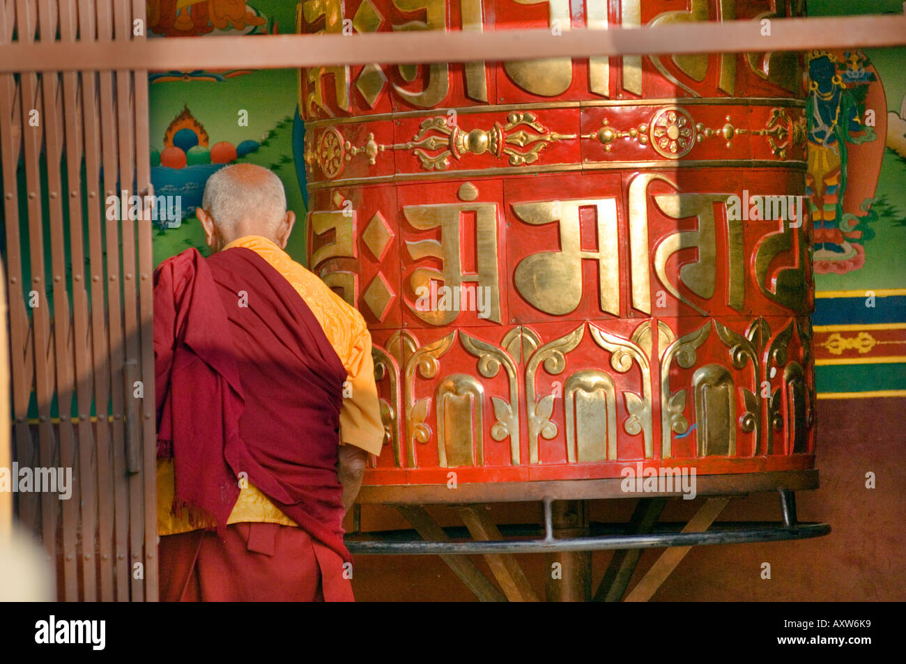 red gold golden big prayer wheel mill friar monk at STUPA Bodhnath ...