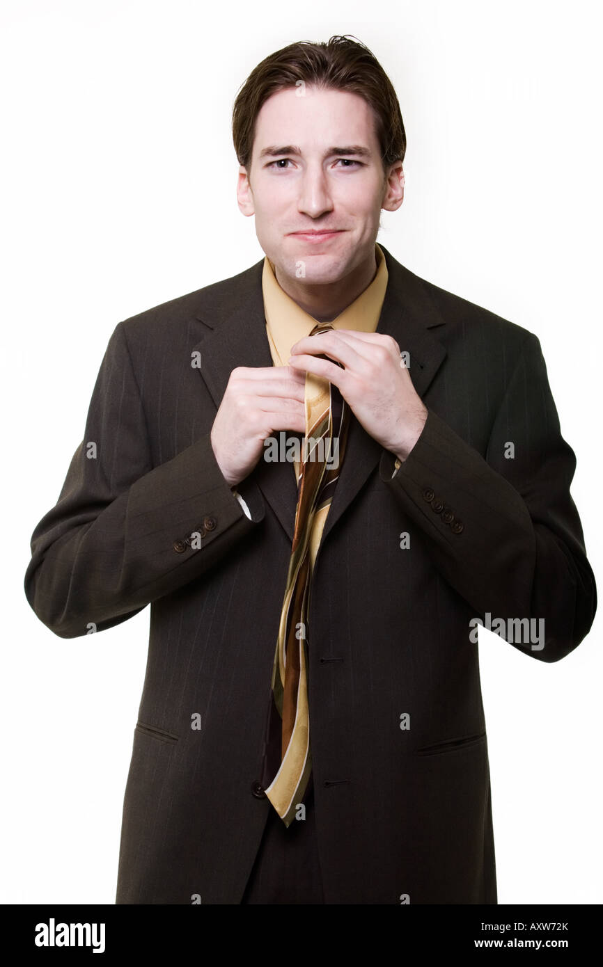Man fixing tie Stock Photo - Alamy