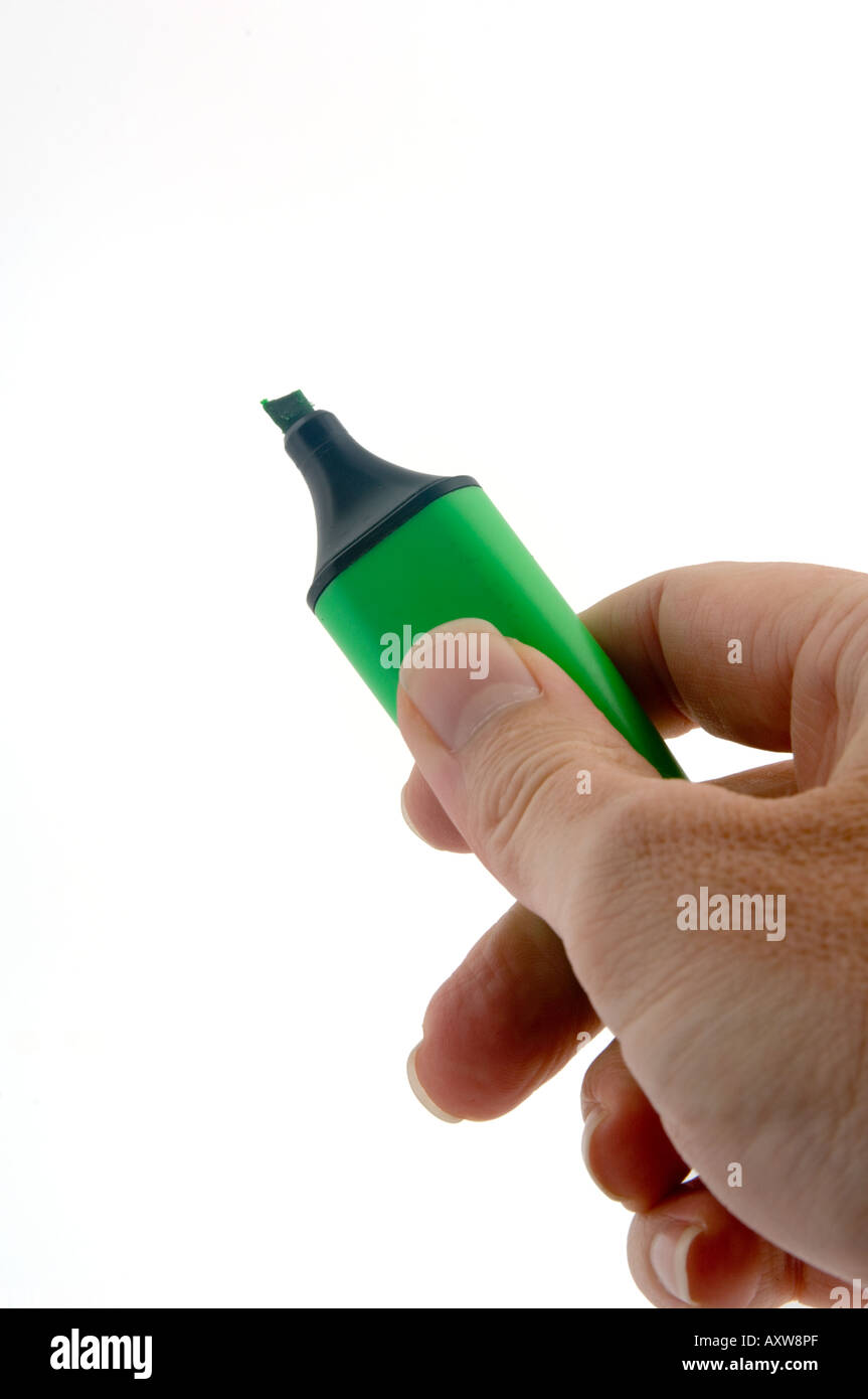 hand holding a green marker pen highlighter Stock Photo - Alamy