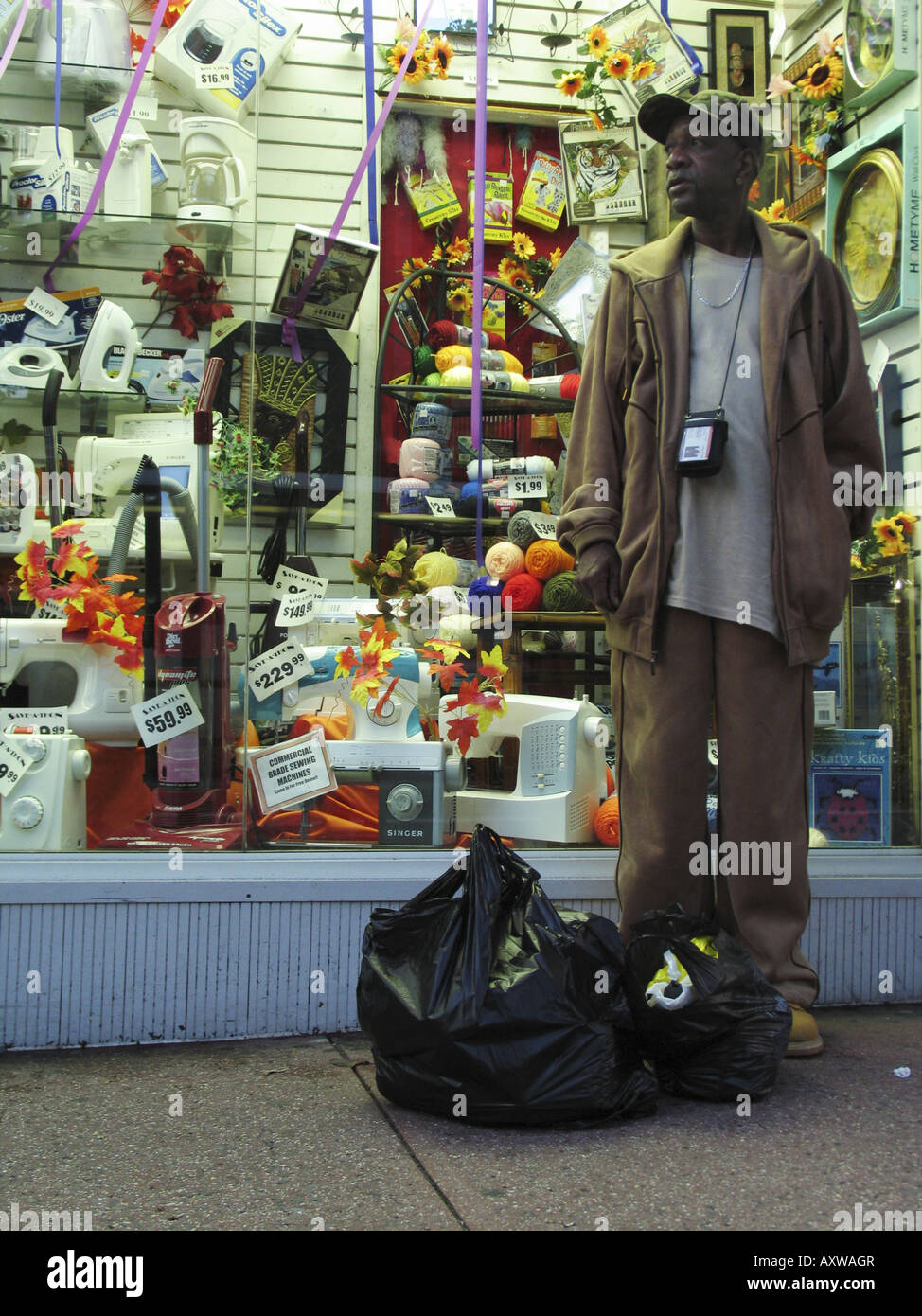 Shop front with pavement display hi-res stock photography and images ...