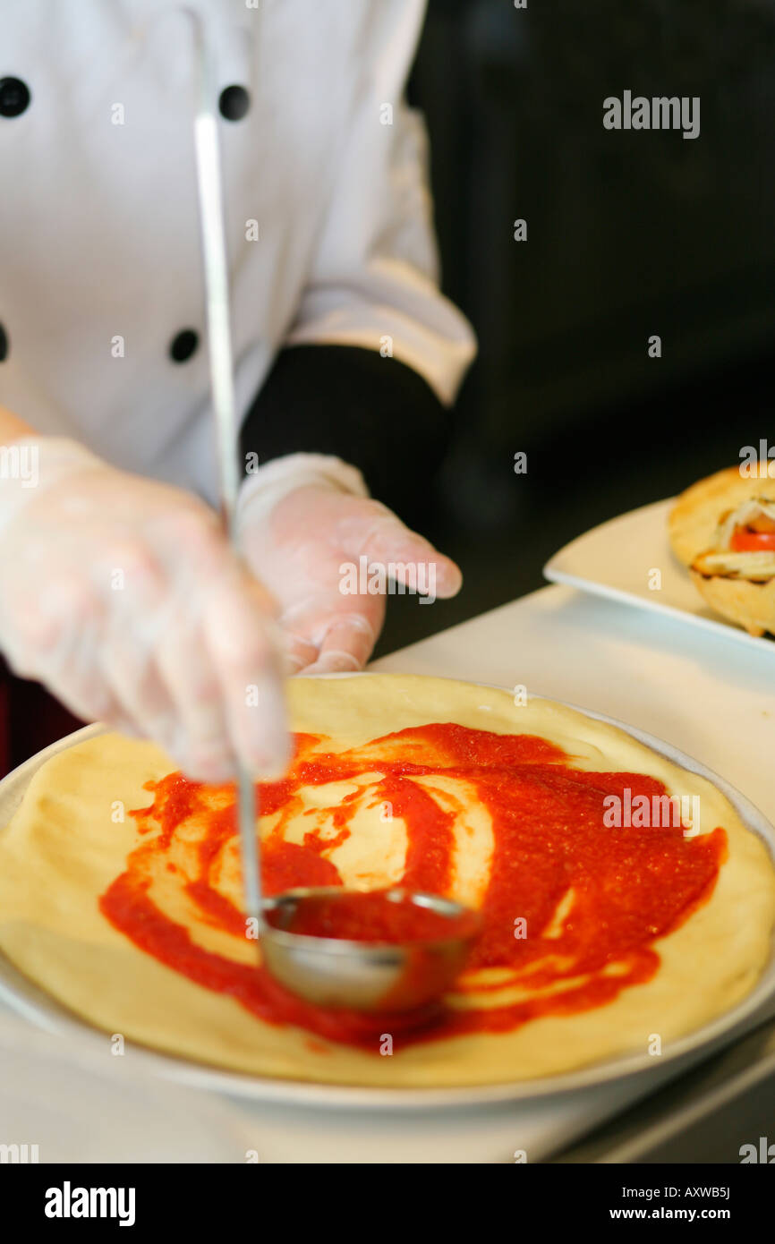 Chef making pizza Stock Photo - Alamy