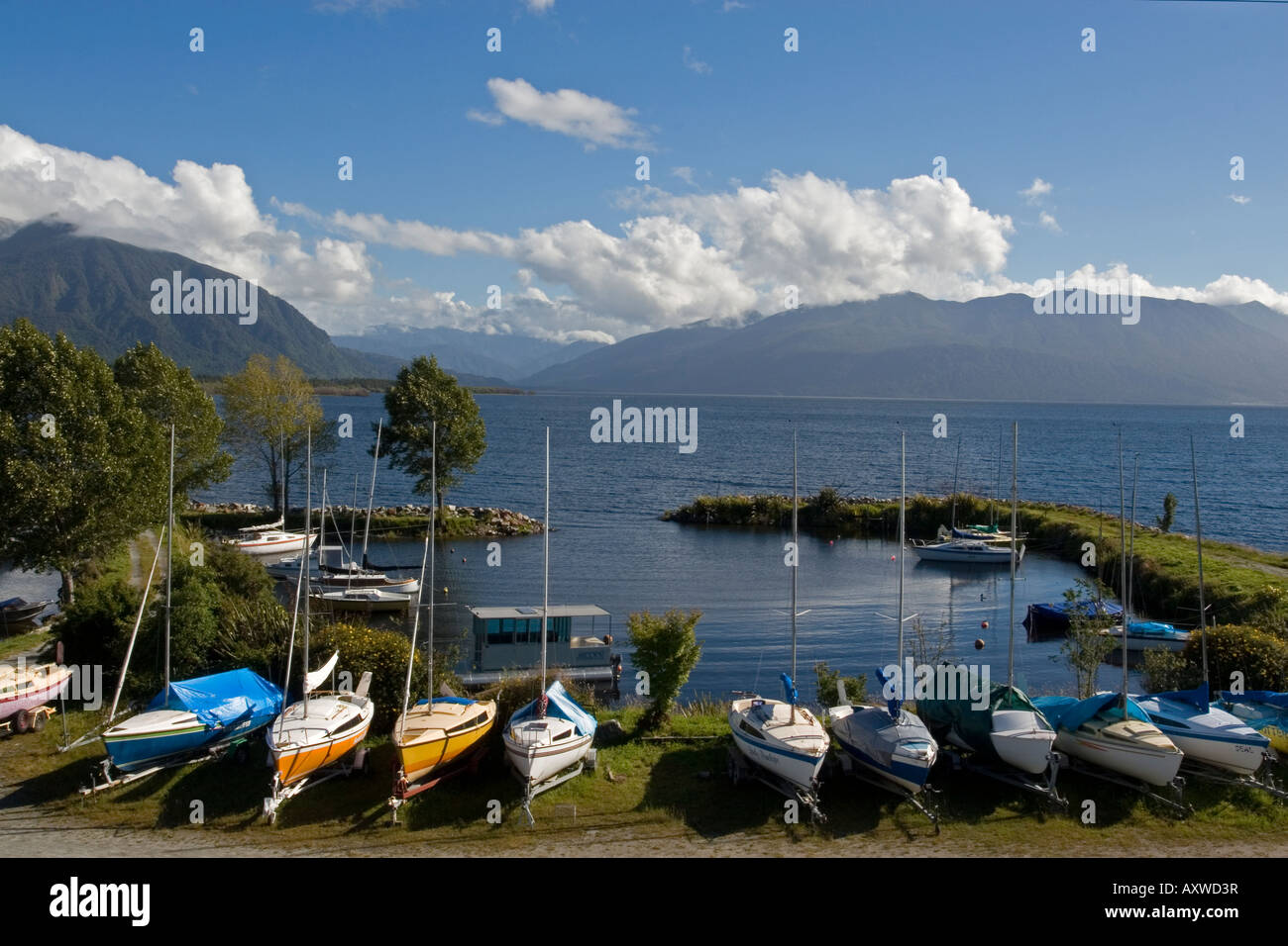 Row of Sailing Boats, Lake Brunner Stock Photo - Alamy