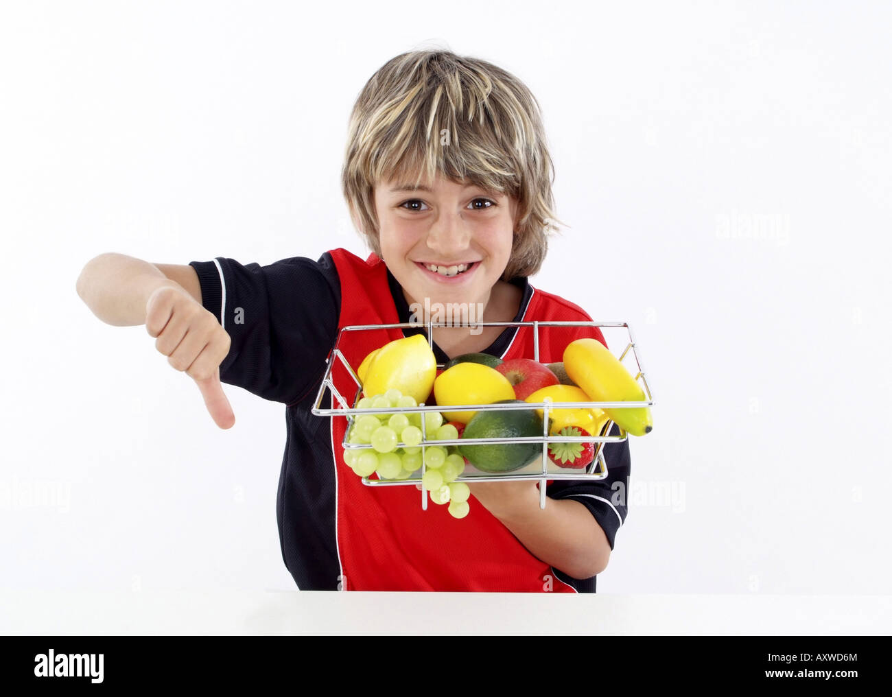 boy dislikes fruits Stock Photo - Alamy
