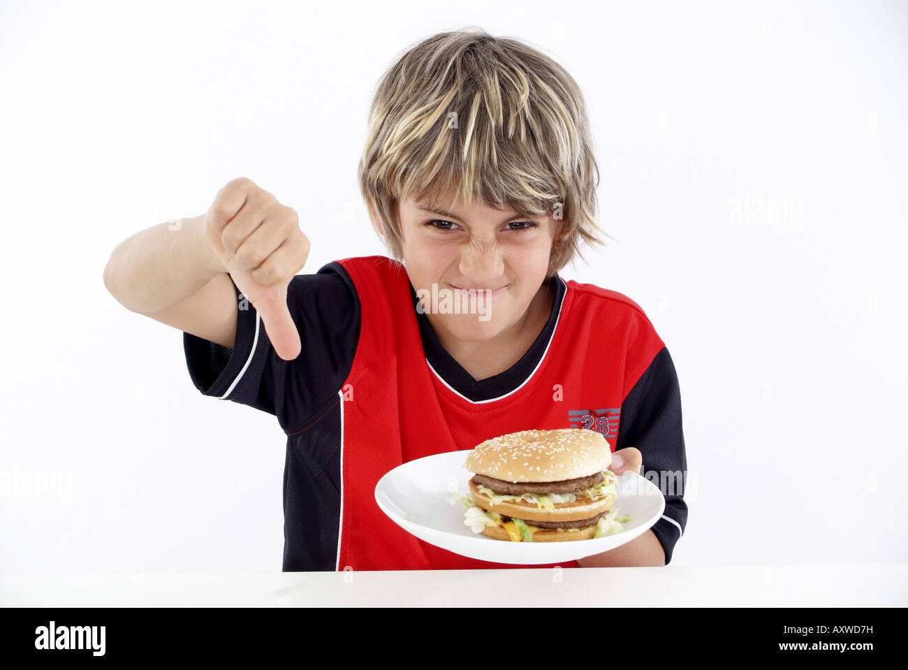 boy dislikes hamburger Stock Photo - Alamy