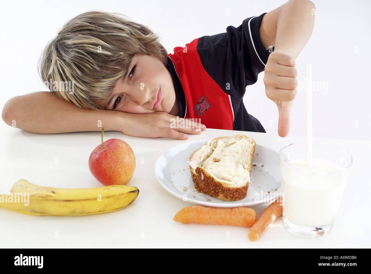 boy does not like healthy breakfast Stock Photo - Alamy