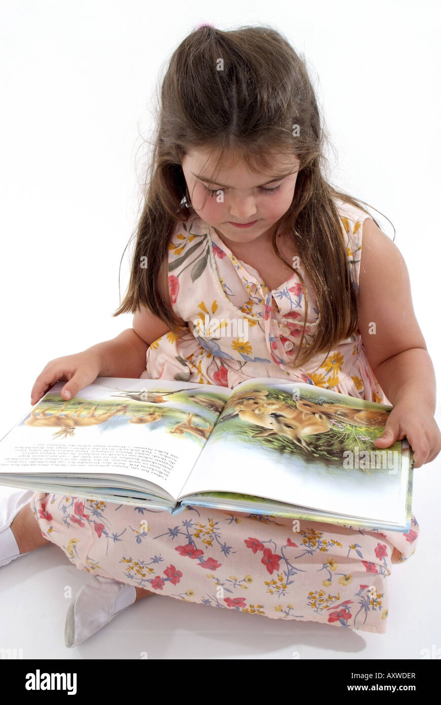 girl with children's book Stock Photo - Alamy
