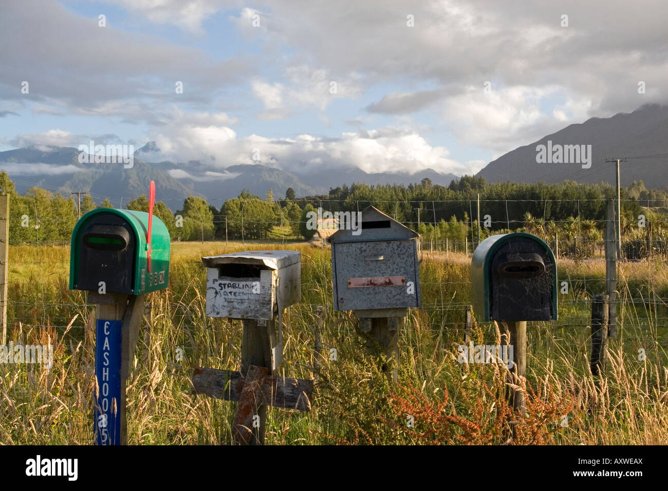 Four Post Boxes Stock Photo - Alamy