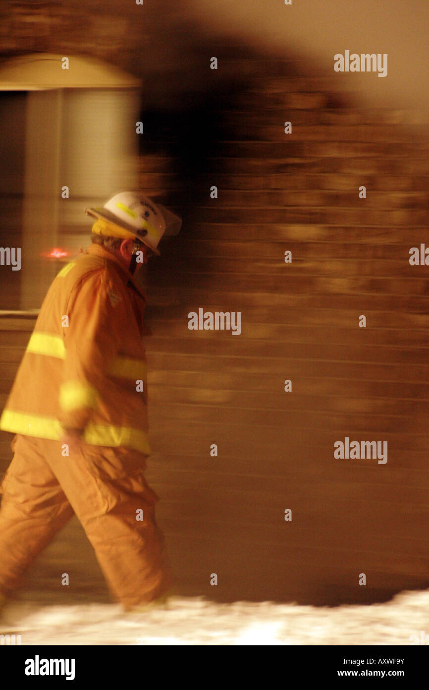 The Fire Chief of Butler Fire Department of Wisconsin is walking into ...