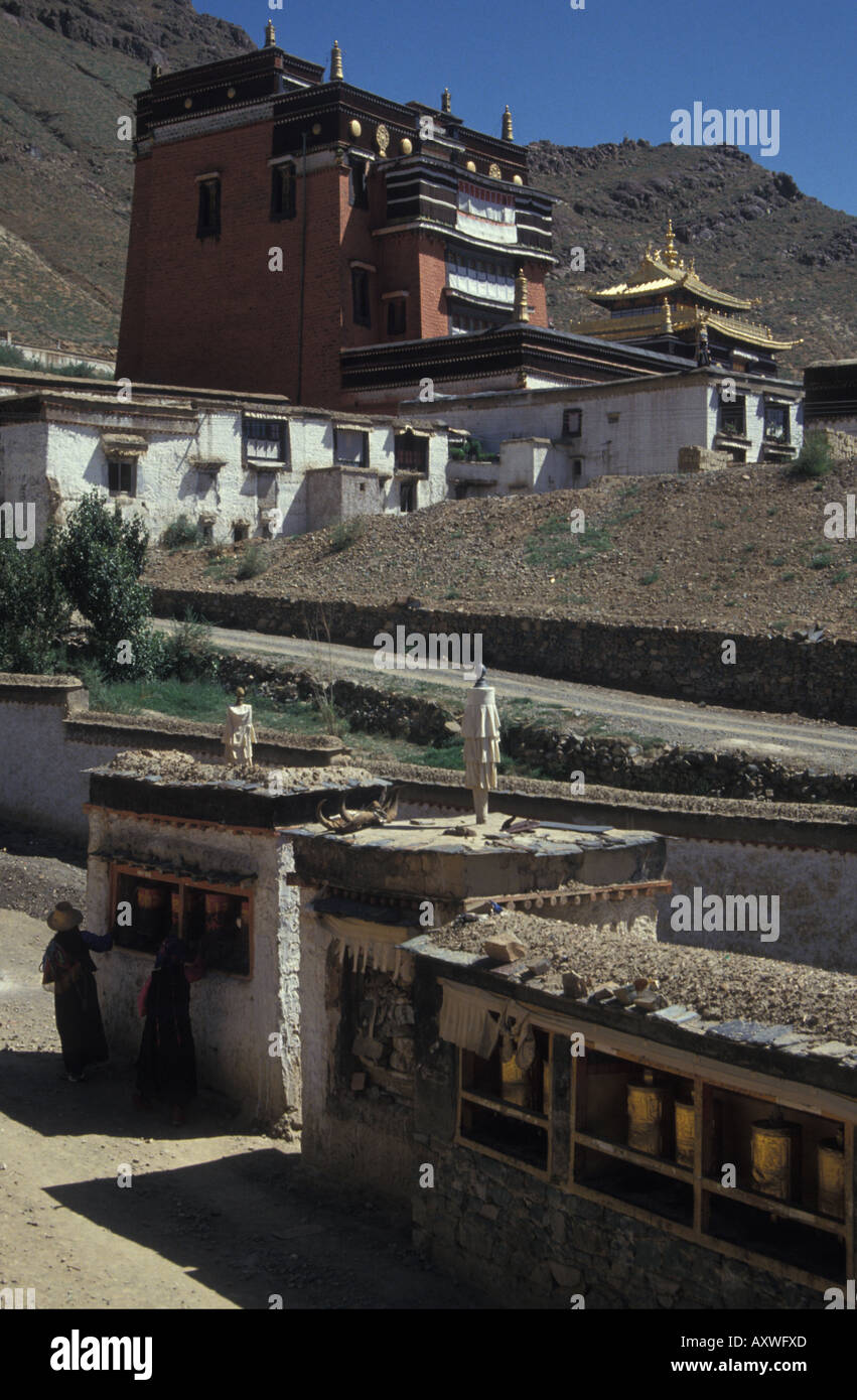 Tibetan pilgrims circumambulating Tashilhunpo monastery Shigatse Tibet ...