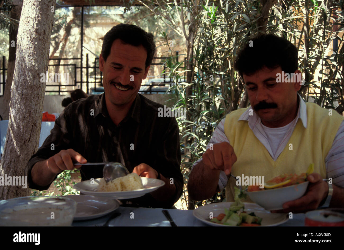 Two men eating lunch Damascus Syria Stock Photo - Alamy
