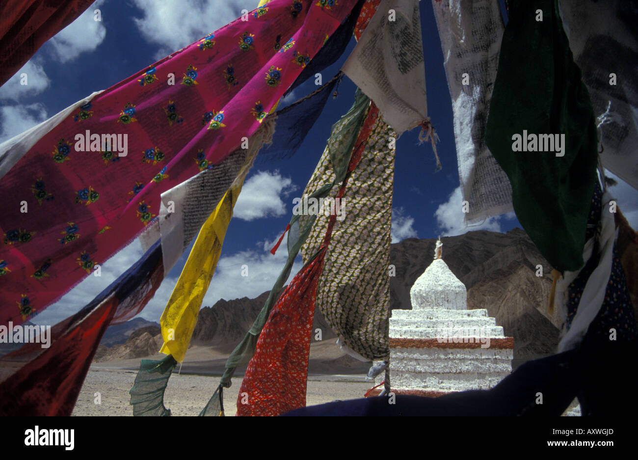 Mahayana Buddhist prayer flags banner pole chorten stupas Tibet China ...