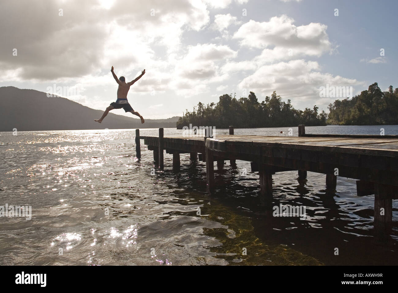 Jumping off jetty hi-res stock photography and images - Alamy