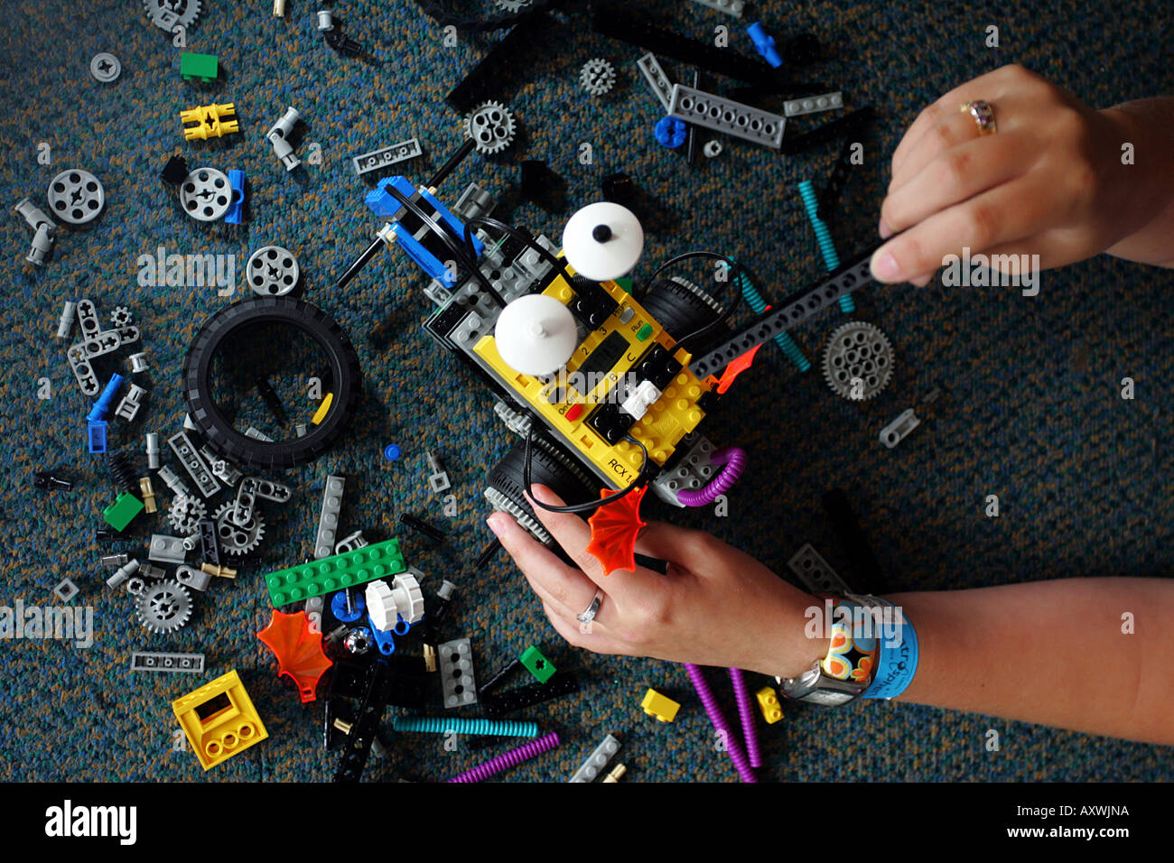 a child playing with lego building bricks Stock Photo - Alamy