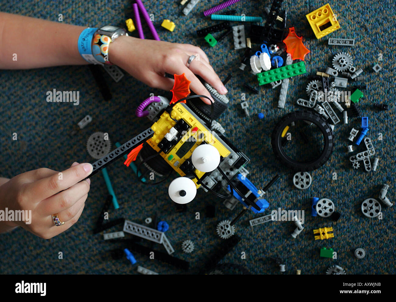 a child playing with lego building bricks Stock Photo - Alamy