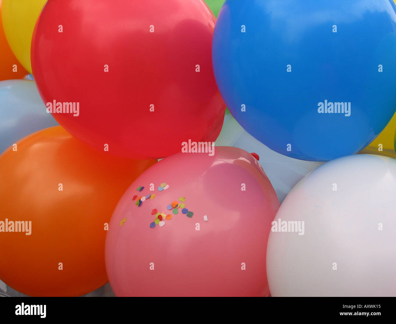 People blowing up birthday balloons hi-res stock photography and images ...