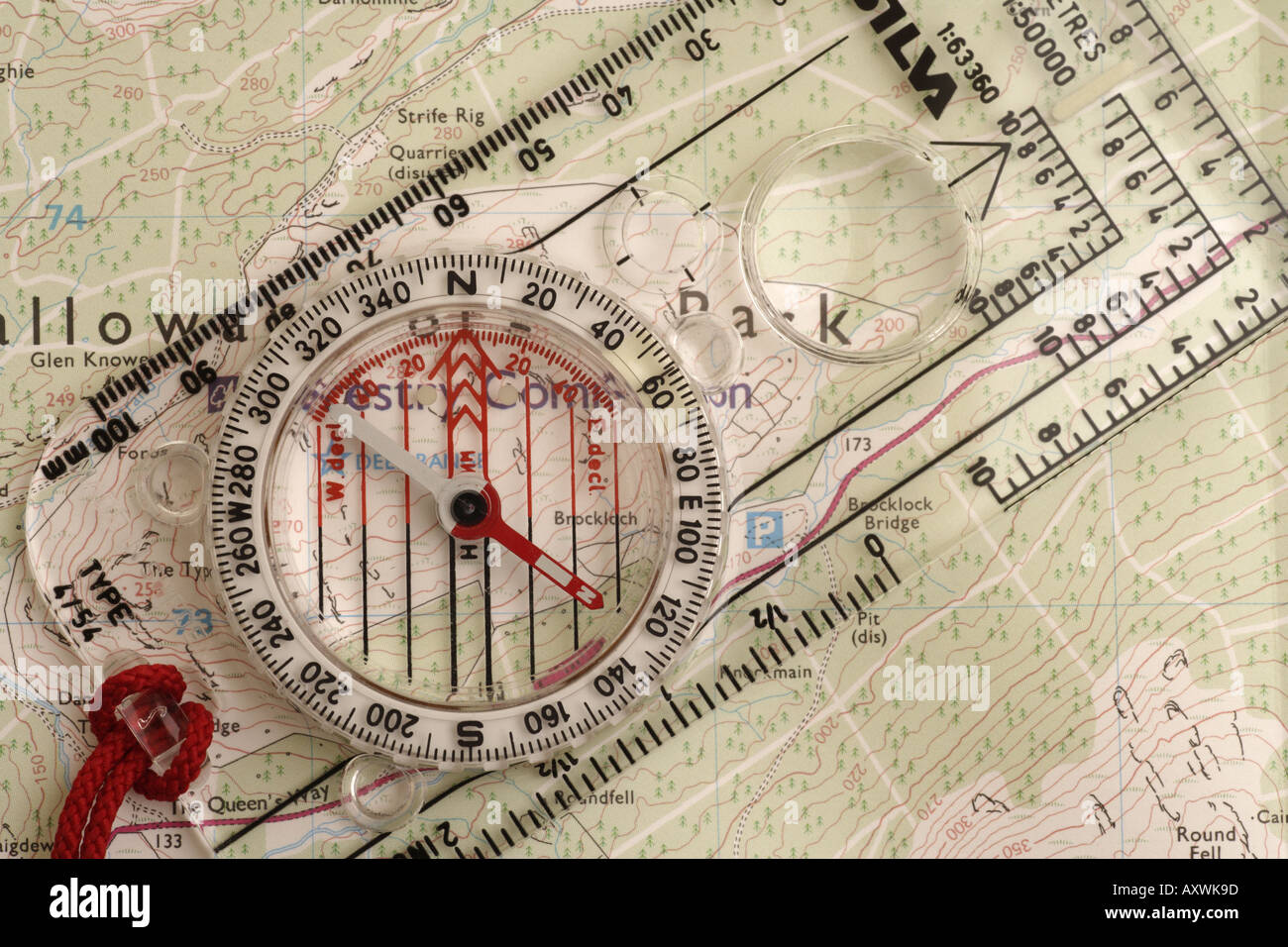 Compass on map Stock Photo - Alamy