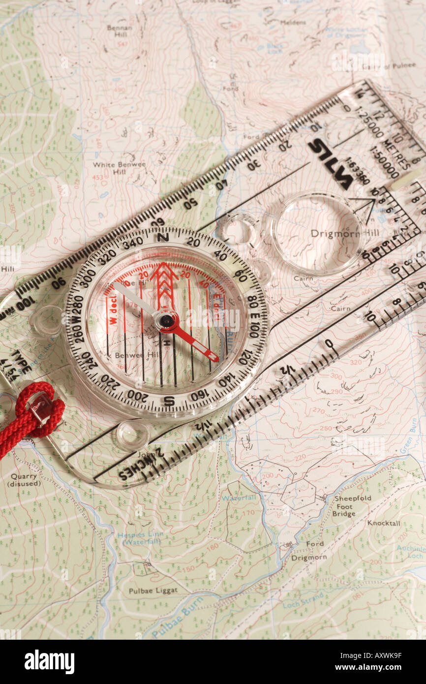 Compass on map Stock Photo - Alamy