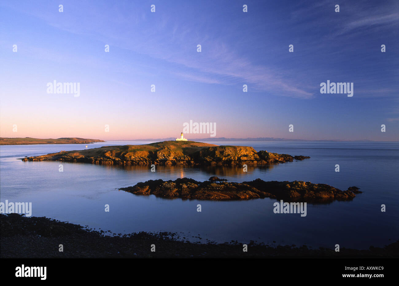 Kirkcudbright Bay Lighthouse on Little Ross catching the vening ...