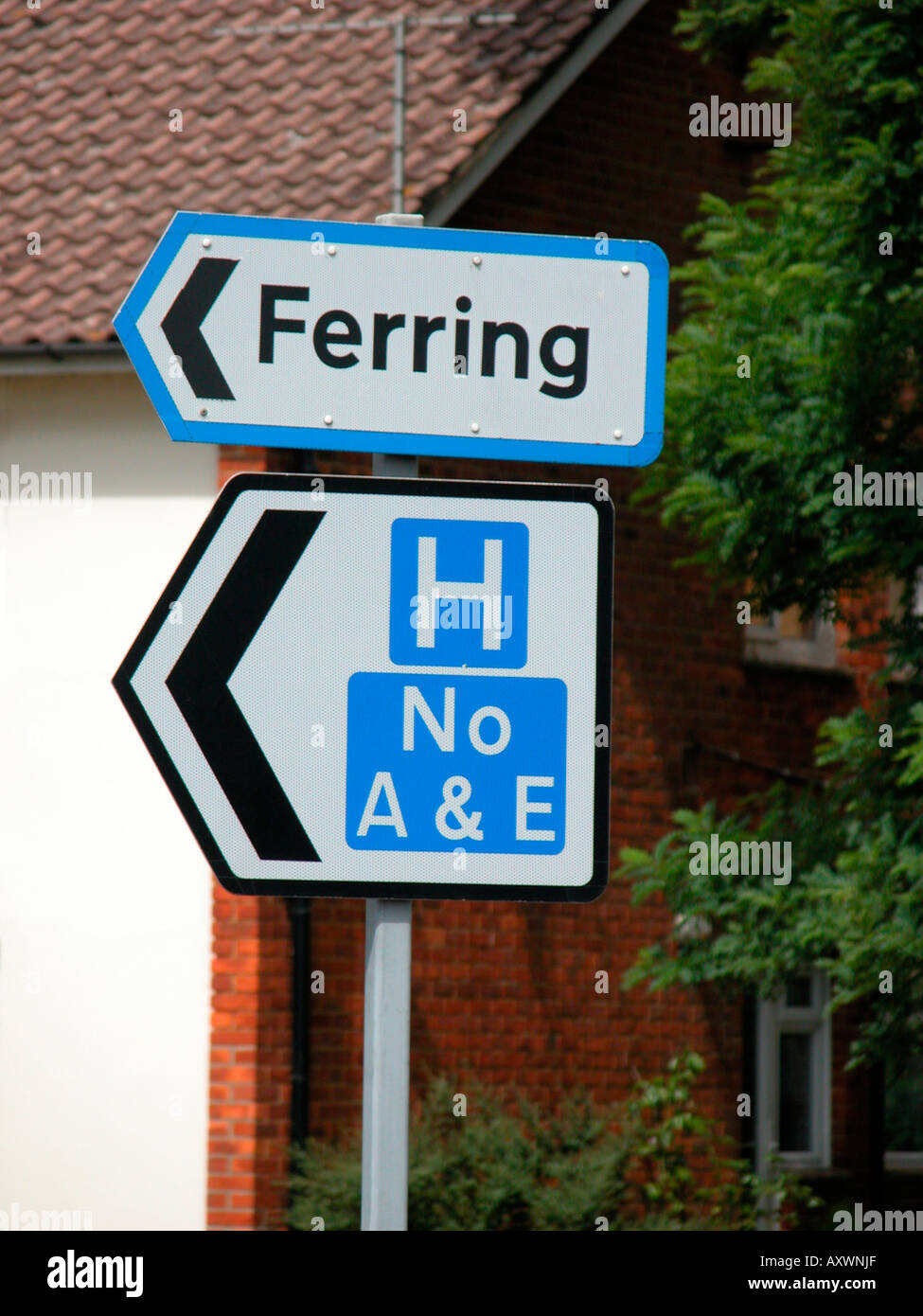 H Hospital sign white on blue background signpost without an a e ...