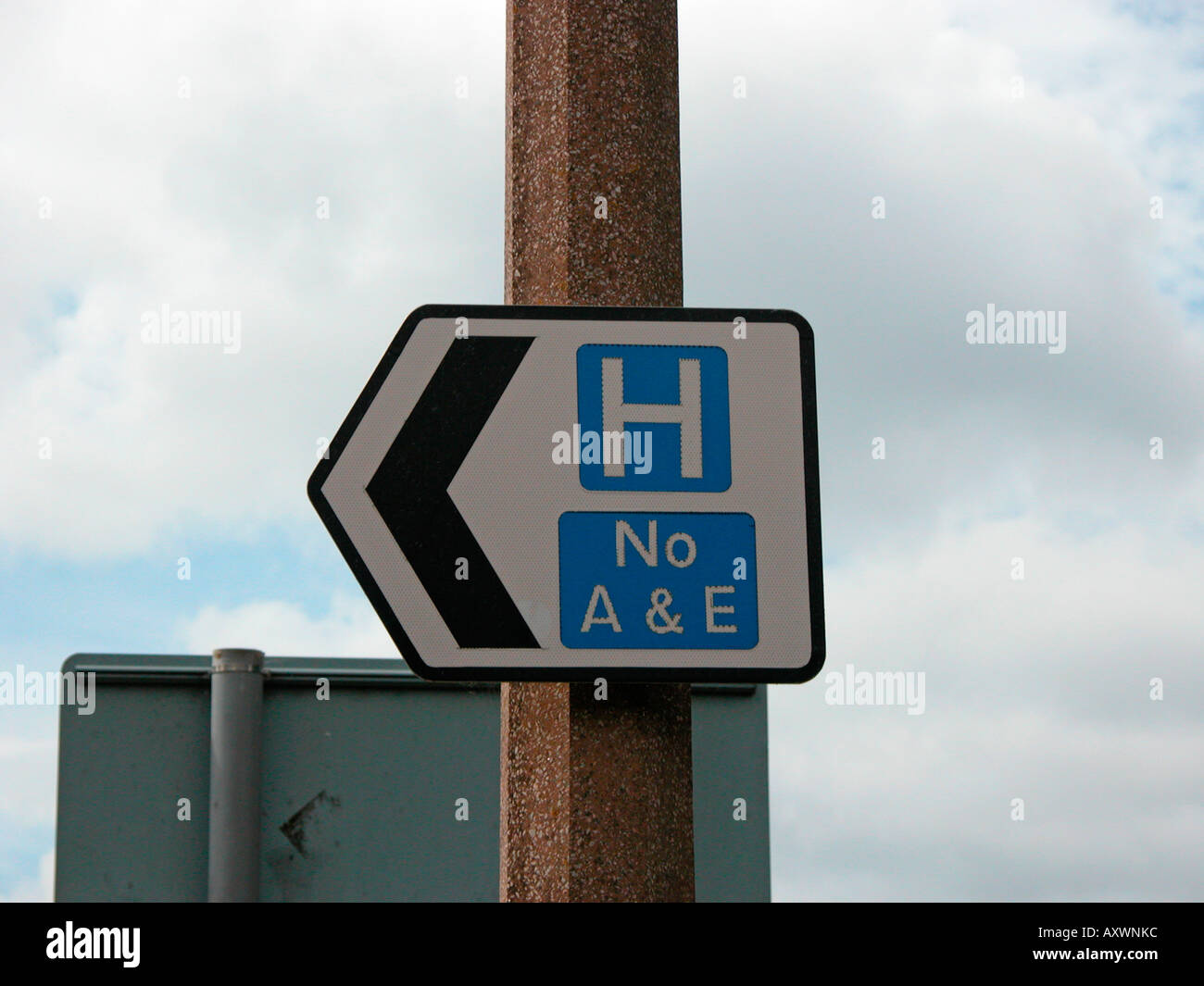 H Hospital sign white on blue background signpost without an a e ...
