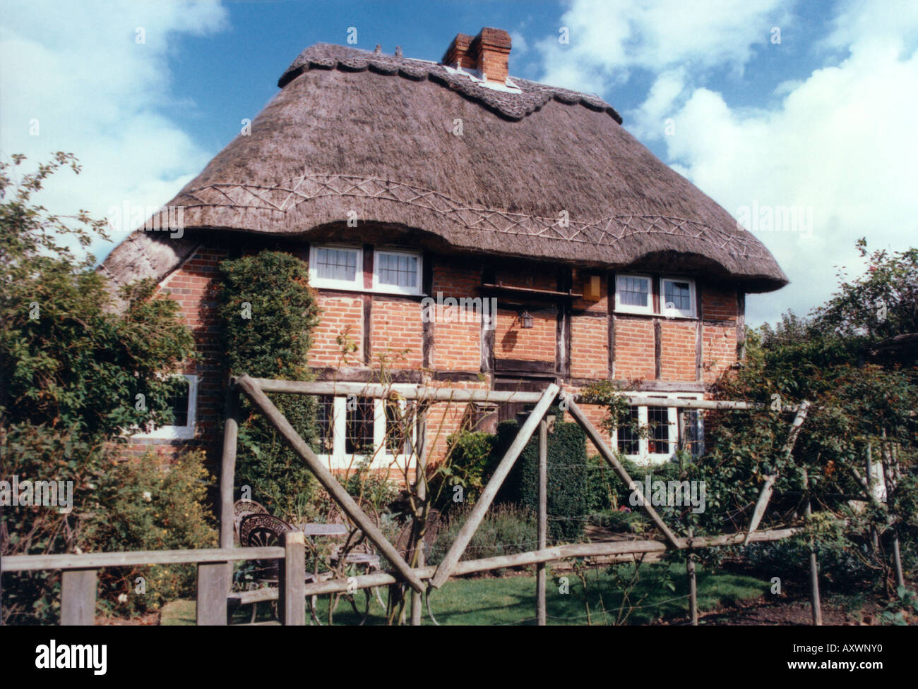 old thatched cottage Patching village West Sussex Stock Photo - Alamy