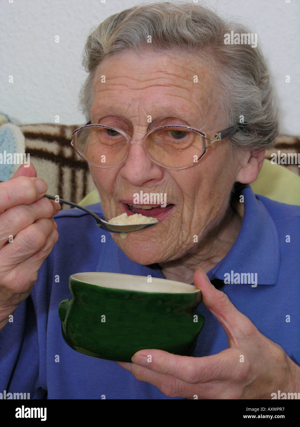 Woman eating rice pudding hi-res stock photography and images - Alamy