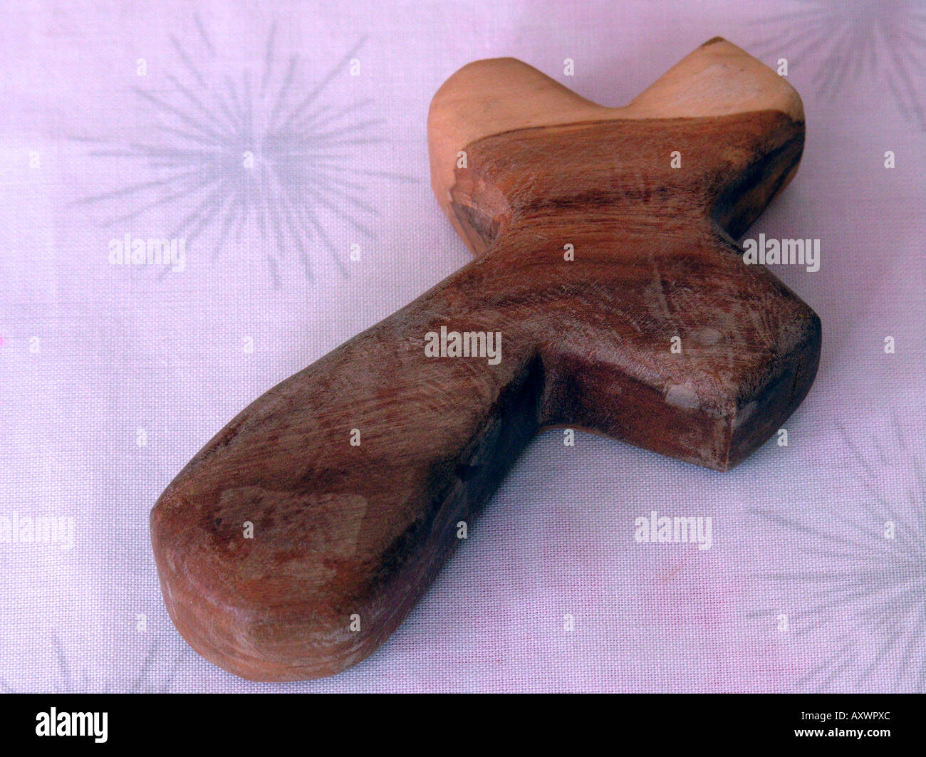 symbolic cross sign cross in the hand Stock Photo - Alamy