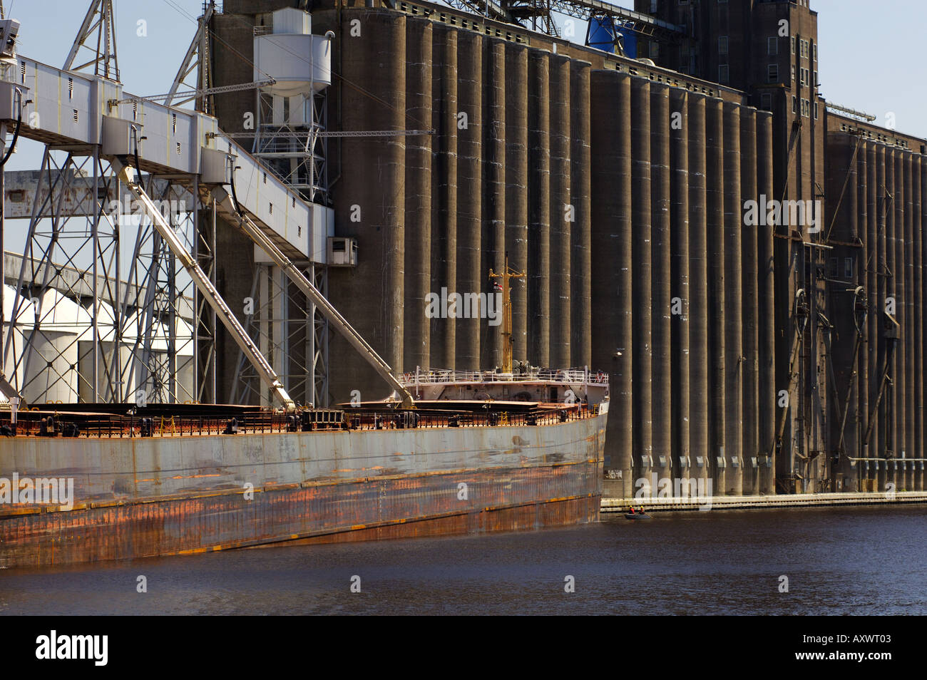 Great Lakes ship being loaded at lakeside elevator near Duluth ...