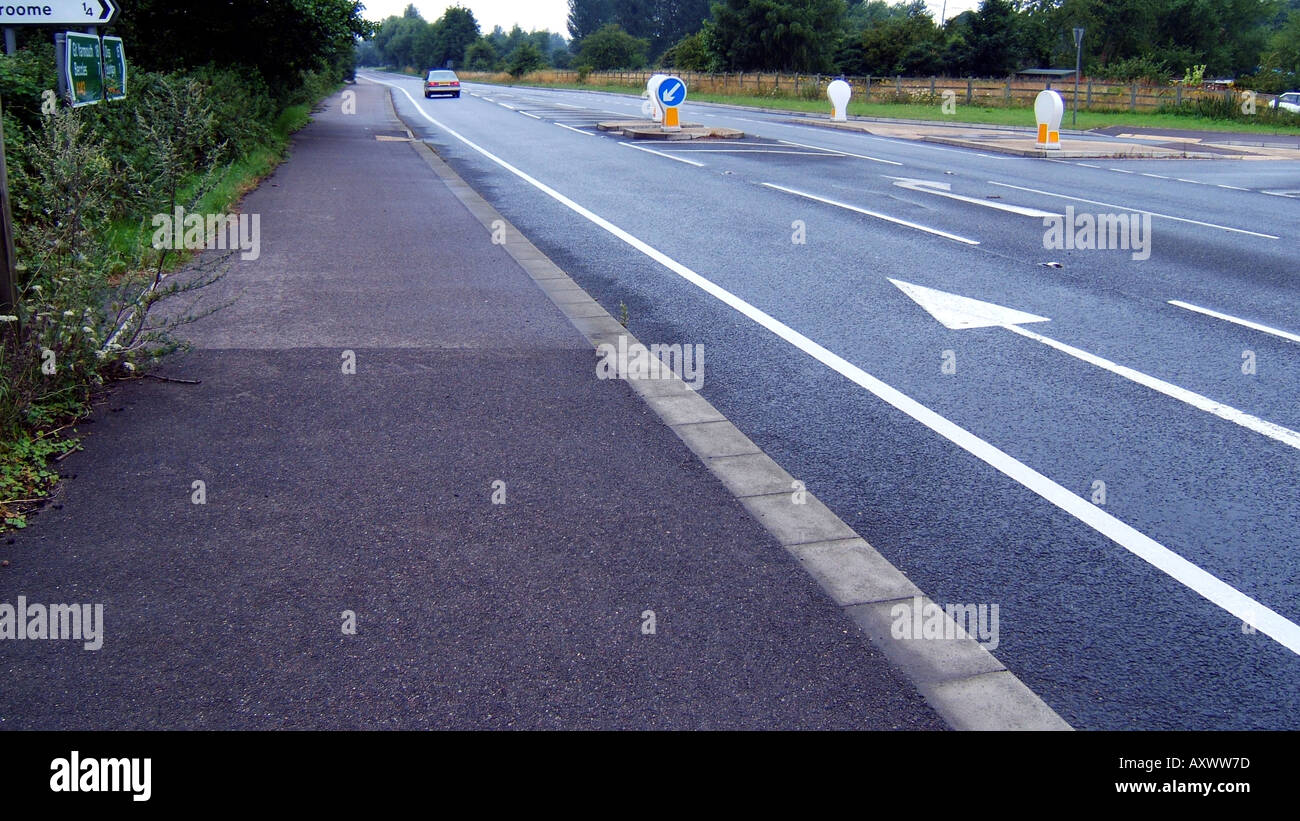 Road and footpath Stock Photo - Alamy