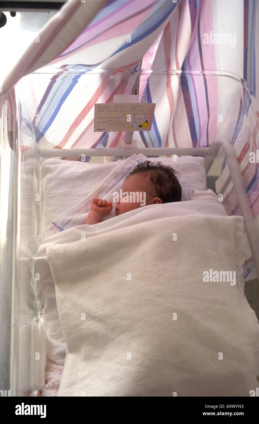 Newborn baby in hospital cradle Stock Photo - Alamy