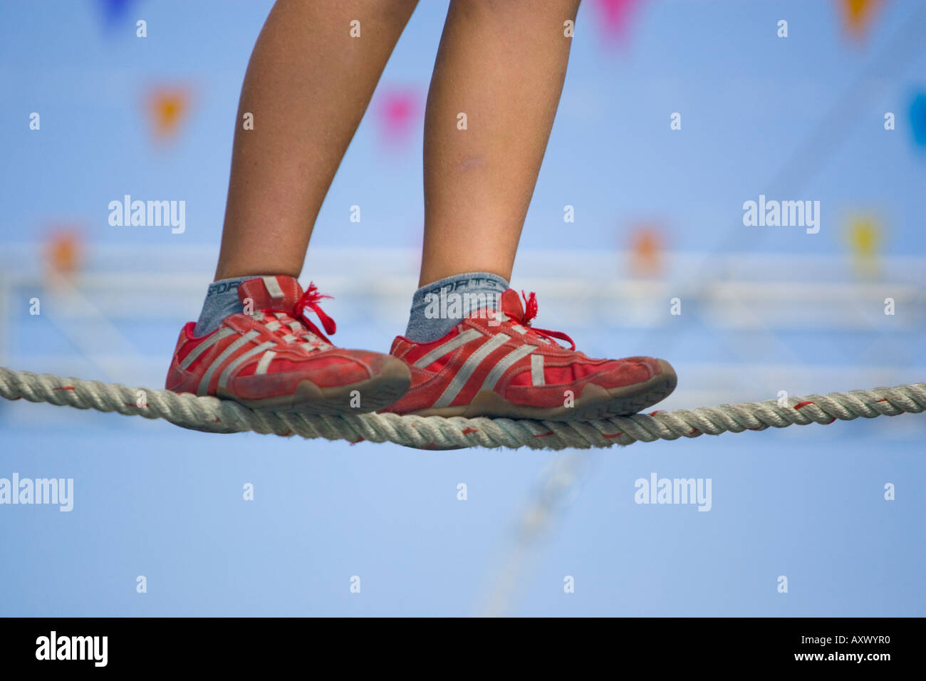 Feet of young child walking along tightrope Bilbao Basque Country Spain ...