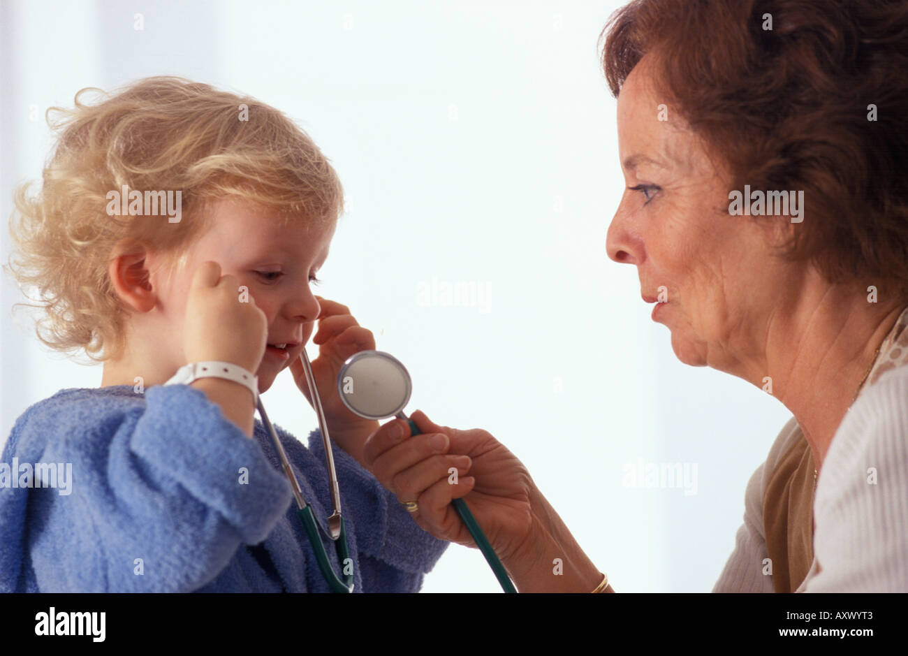Female doctor with child Stock Photo - Alamy