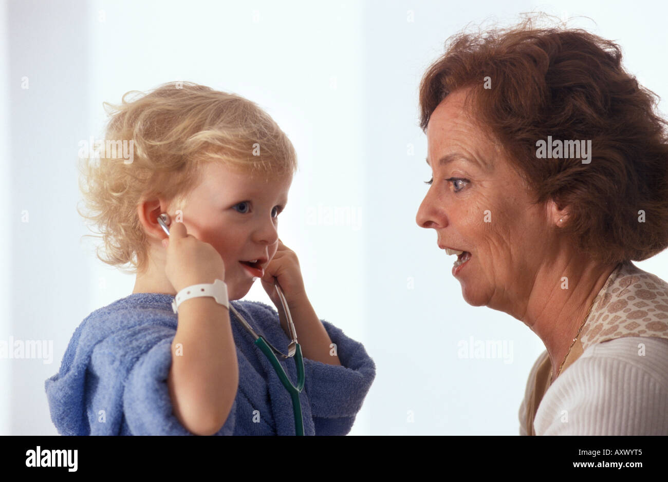 Female doctor with child Stock Photo - Alamy