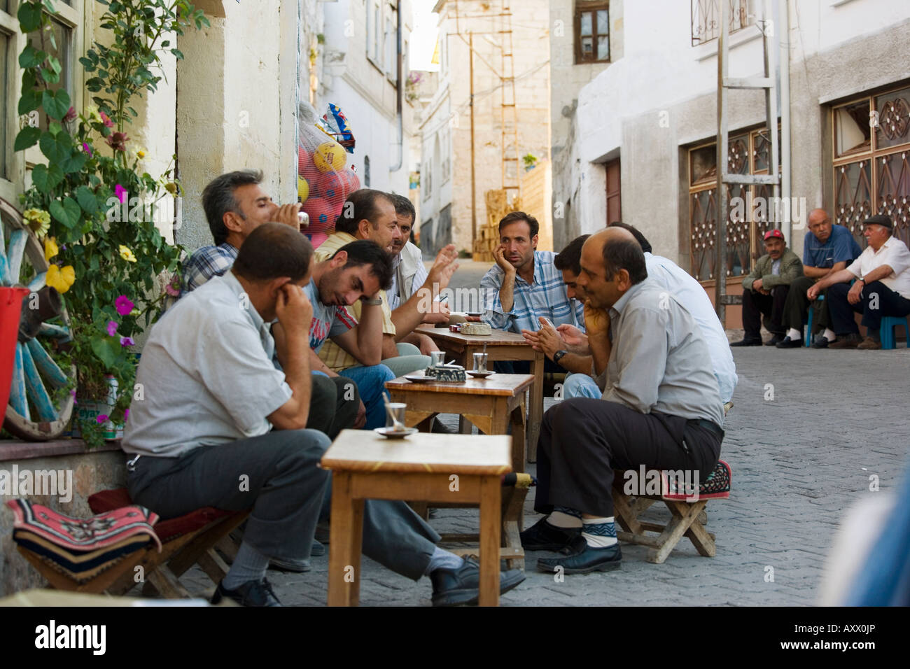 Men drinking tea in town square, Ibrahimpasa, Cappadocia, Turkey Stock ...