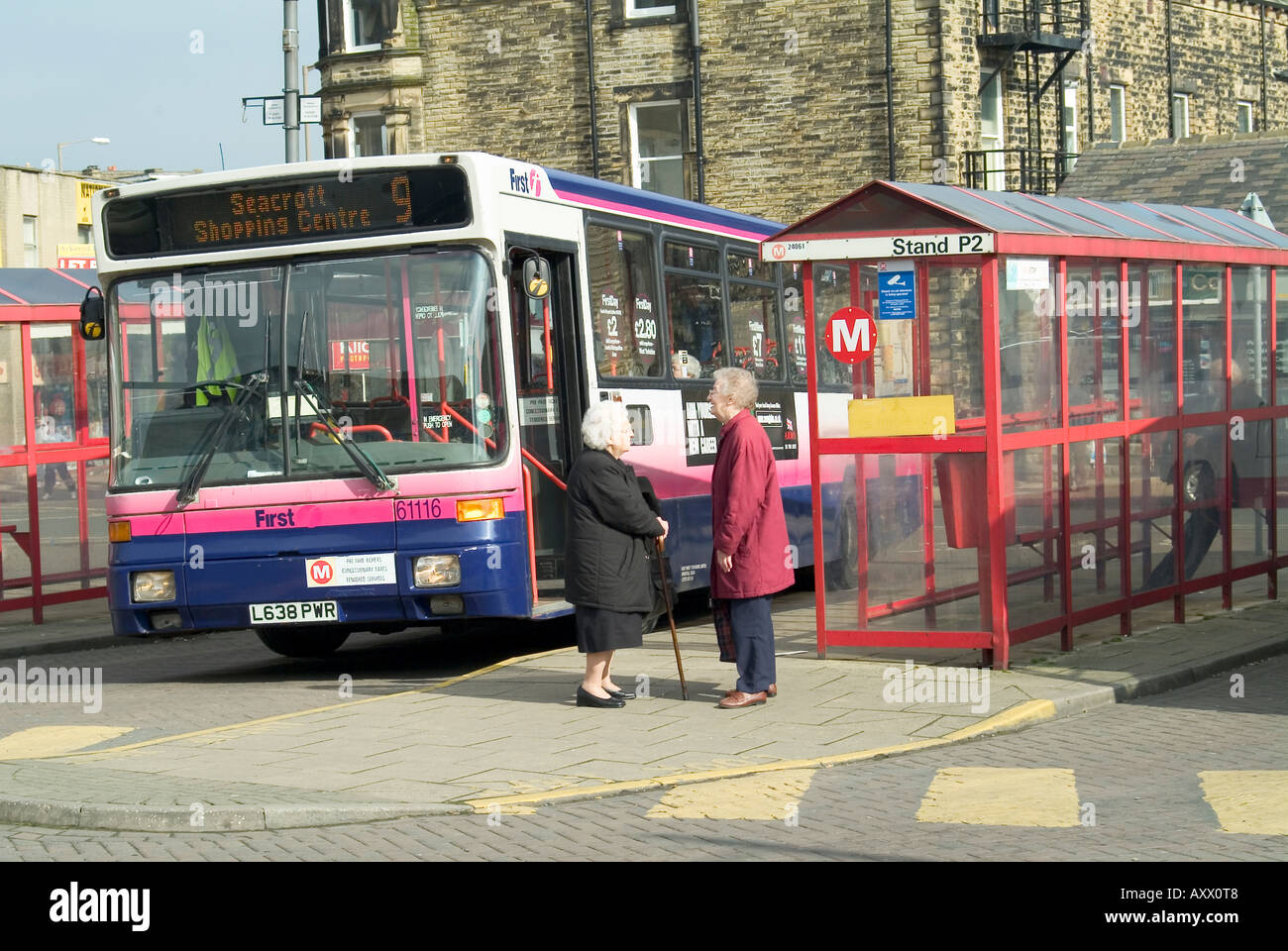 First group bus and elderly passengers at Pudsey bus station Yorkshire ...