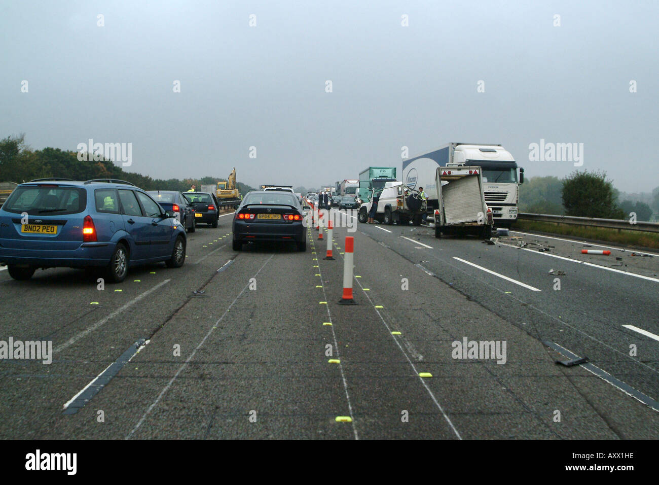Road traffic accident in a stretch of roadworks on an English motorway ...