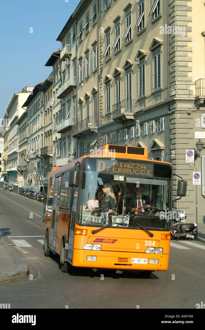 A bus makes its way through the streets of Florence, Tuscany, Italy ...