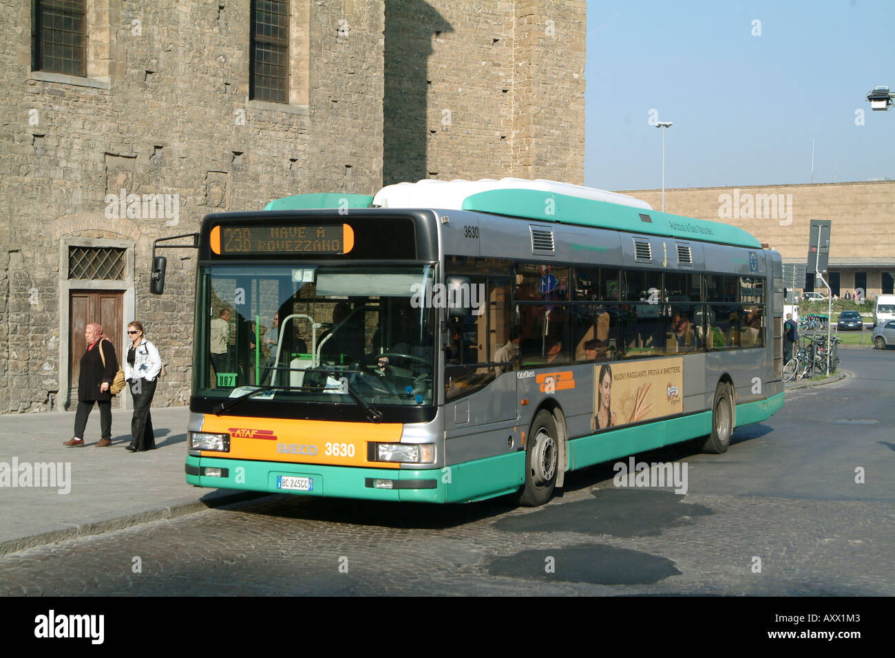 Gas powered bus on the street in Florence Italy Stock Photo - Alamy