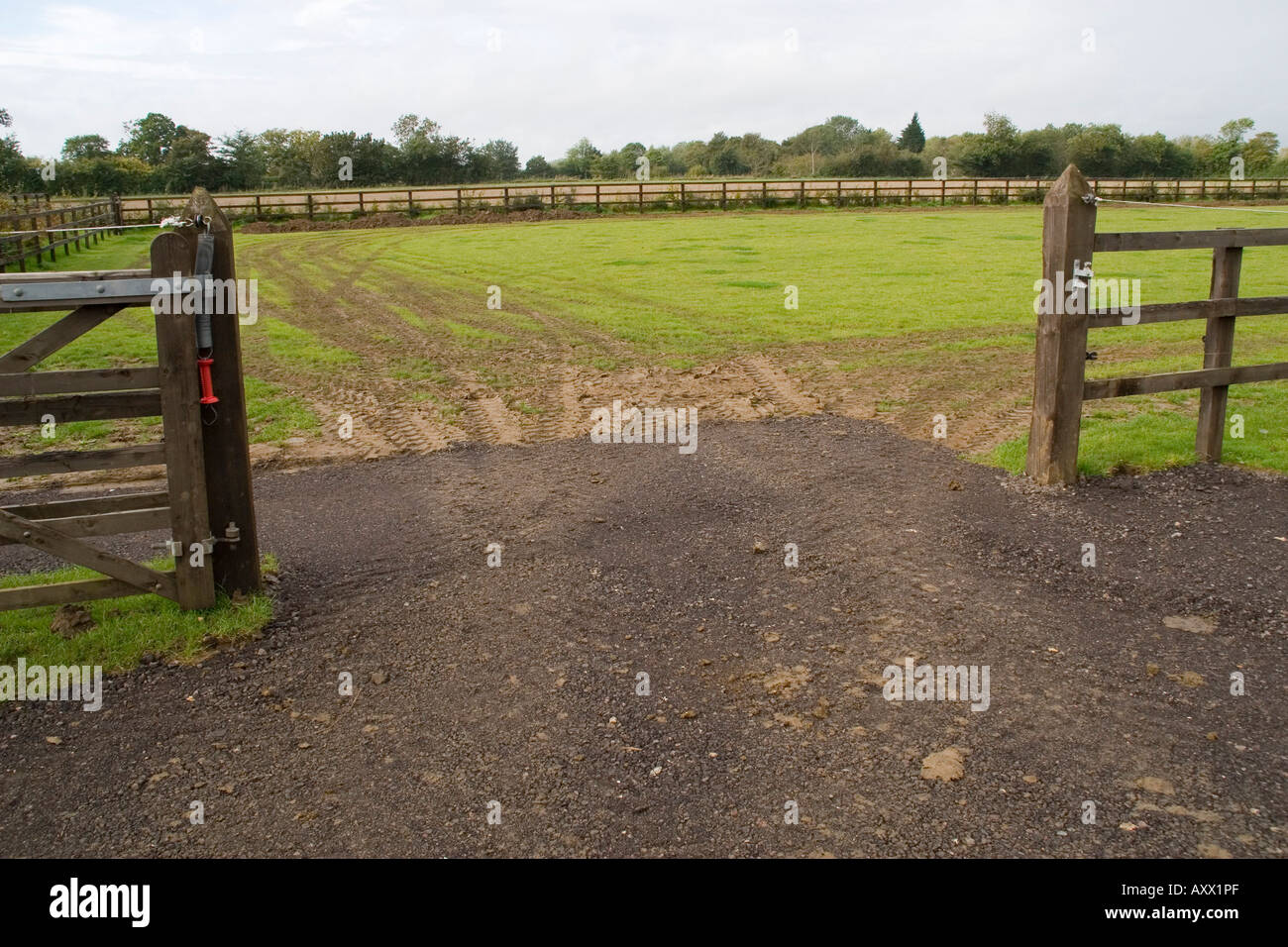 old road chipping used around gate way Stock Photo - Alamy