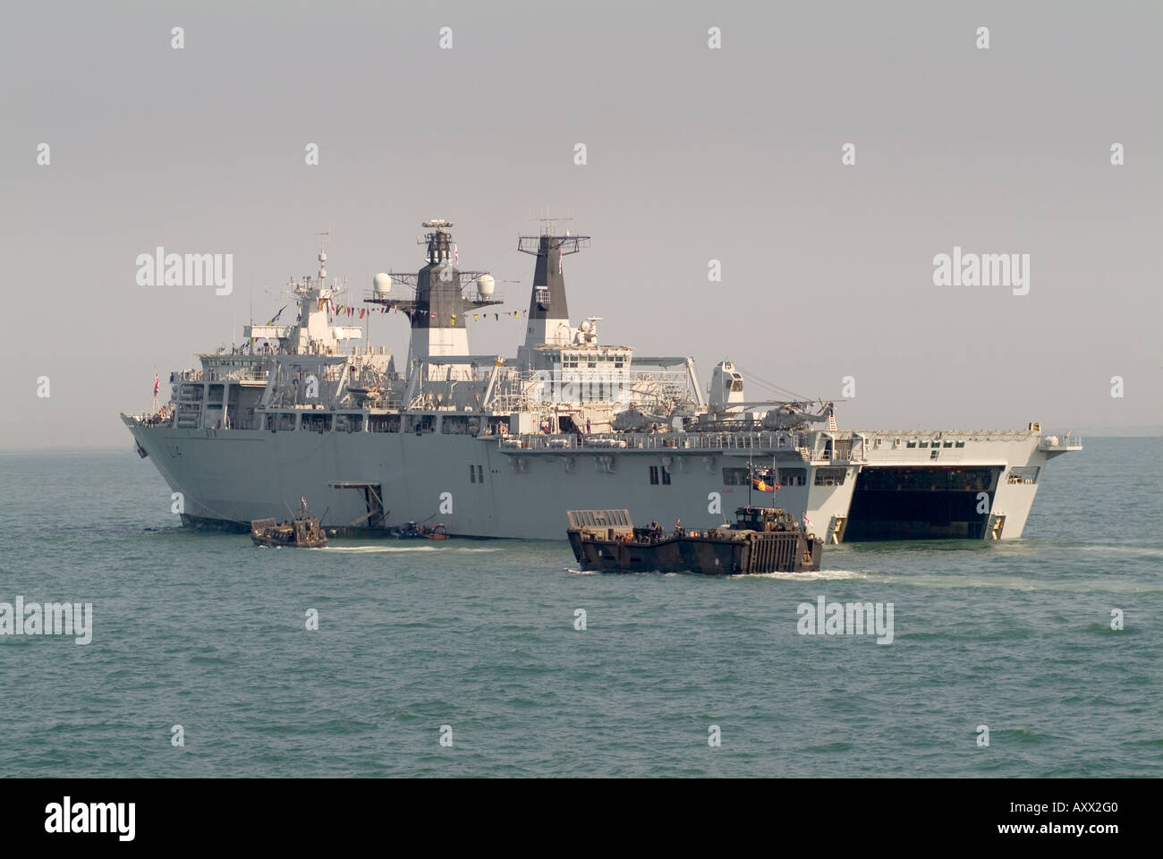 Assault ship HMS Albion L14 with landing craft Stock Photo - Alamy