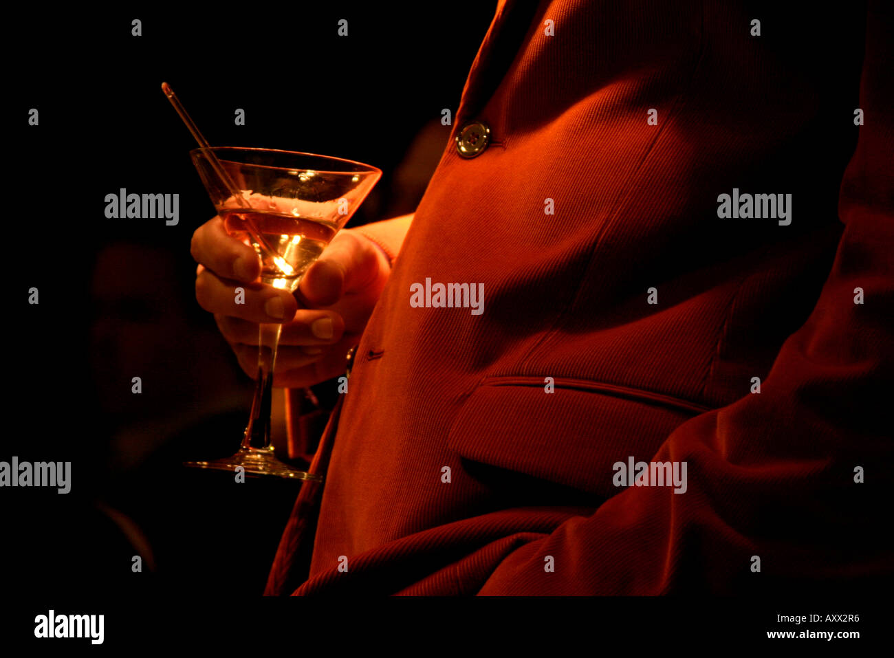 Man holding martini Stock Photo - Alamy
