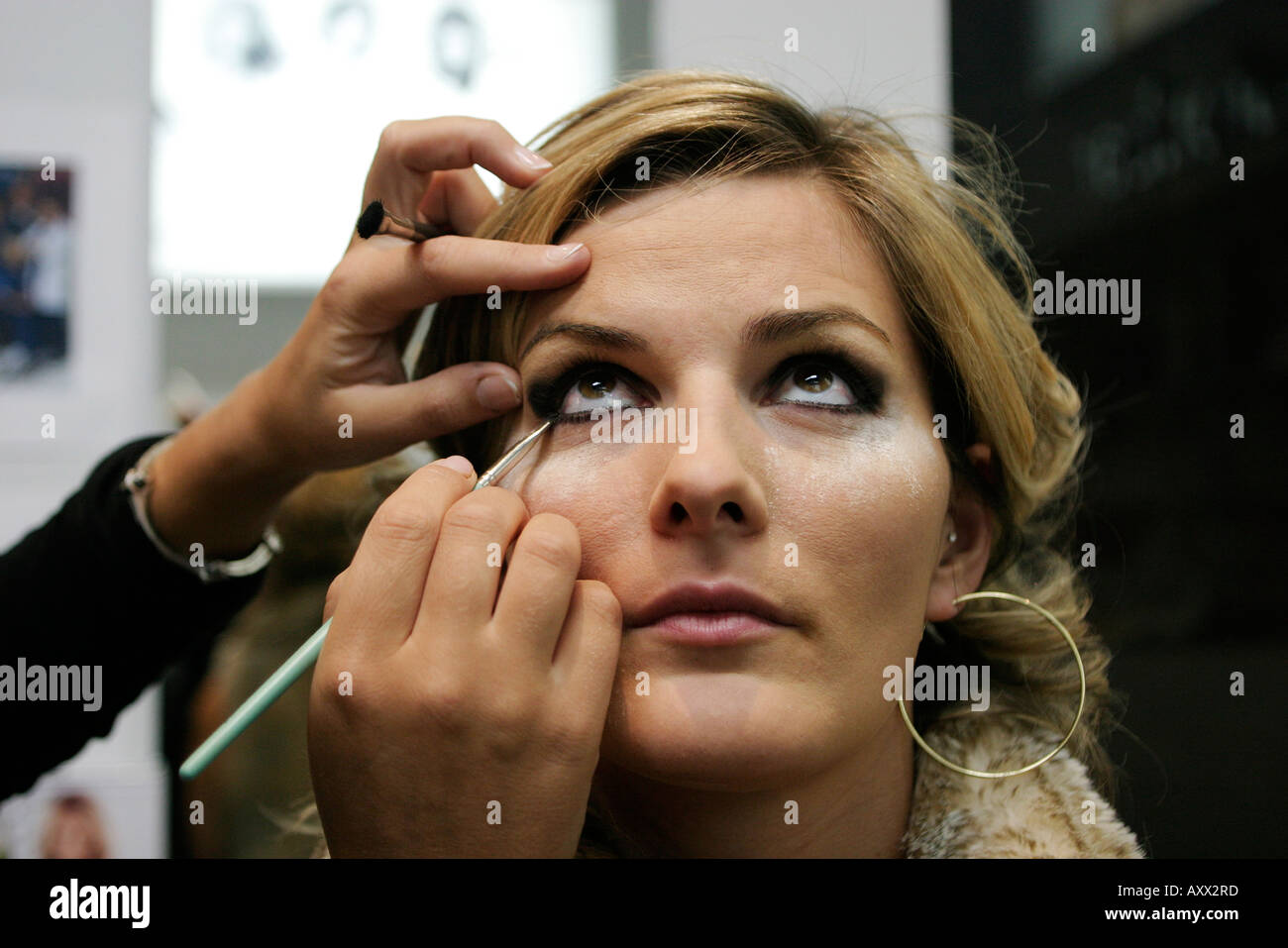 Makeup artist at work Stock Photo - Alamy