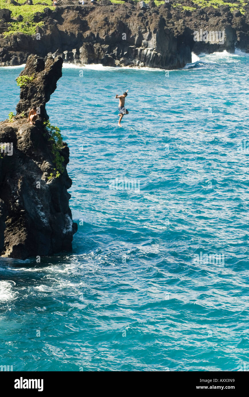 Dive from the cliff: Boy 2 Stock Photo - Alamy
