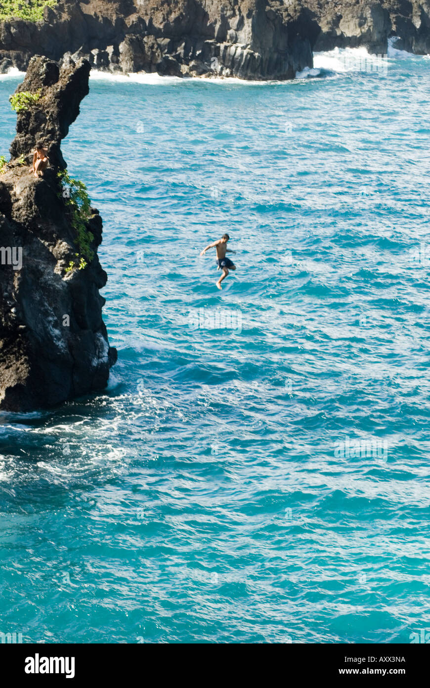 Dive from the cliff: Boy 3 Stock Photo - Alamy